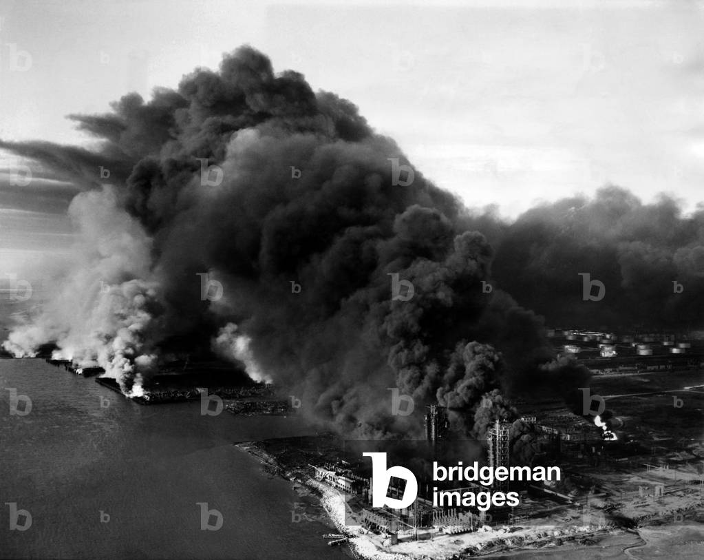 Oily black smoke rises from the Texas City Monsanto Chemical Company ...