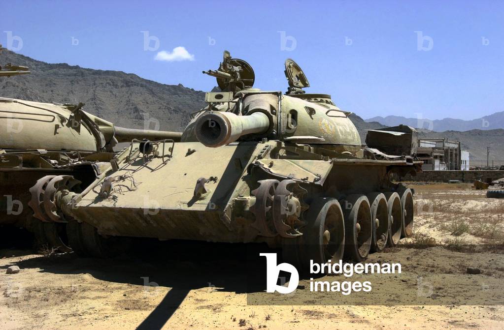 Image of Afghanistan: Two Soviet T-55 Main Battle Tanks sit rusting in