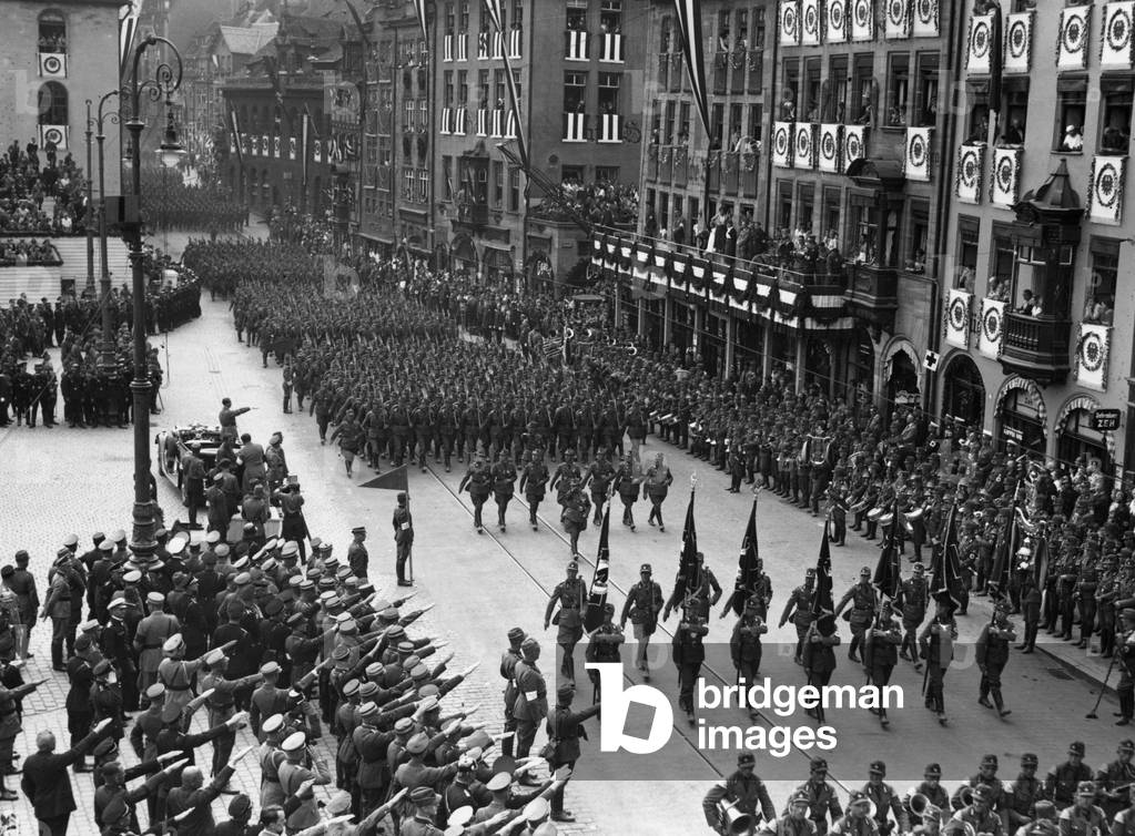 Image of March of the RAD past Adolf Hitler at the 1934
