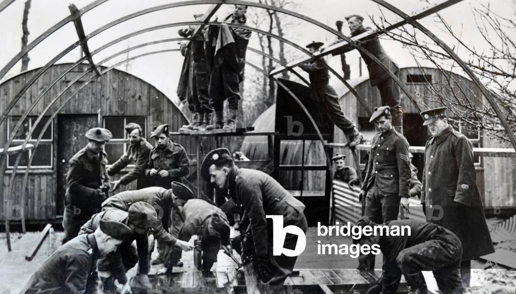 Image of World War Two: British soldiers build accommodation at a barracks,