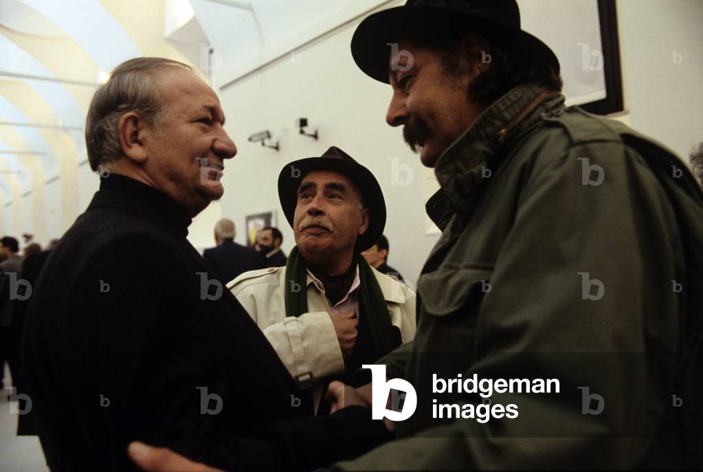 Image of Men attending the American artist Andy Warhol (Andrew Warhola Jr.