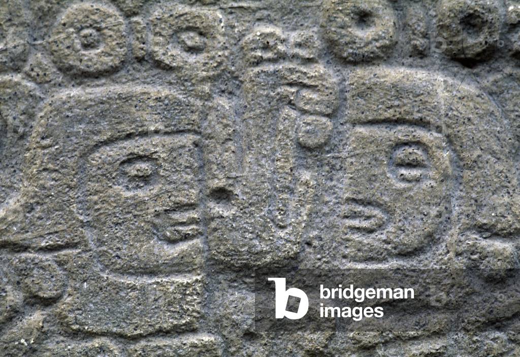 Image of Two figures seen in profile, relief on stele from north