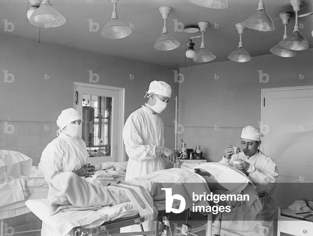 Image of Surgeon Operating on Patient, 1922 (b/w photo) by National ...