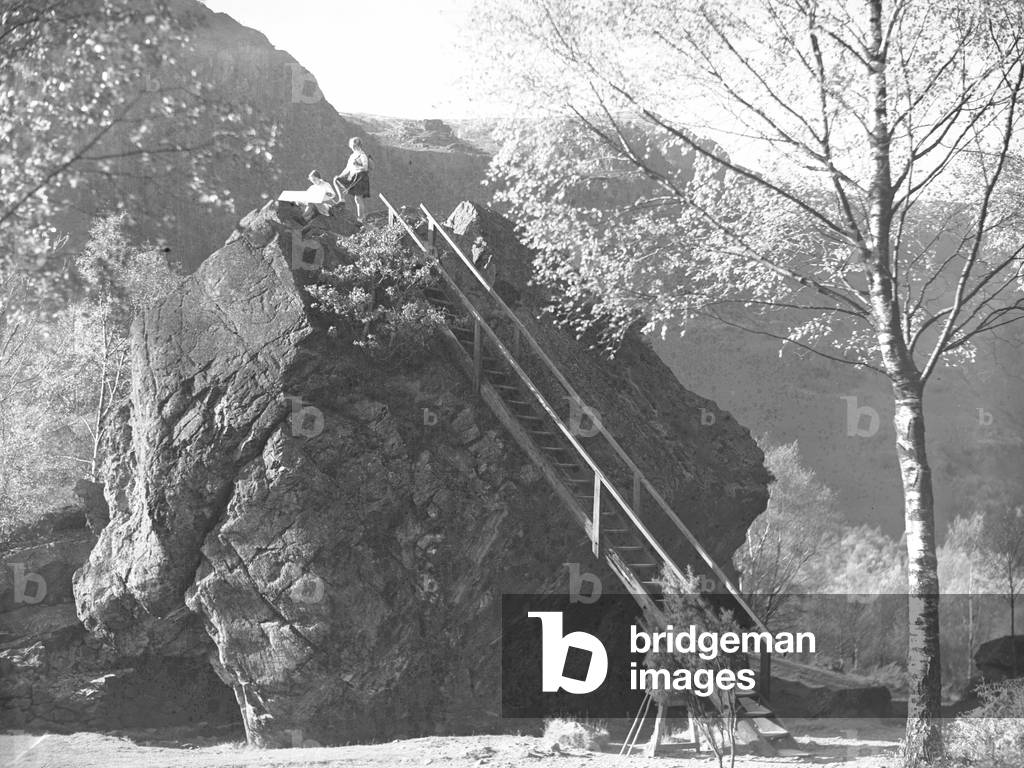 Image of Two children on top of Bowder Stone, 1930s-60s (b/w photo) by ...