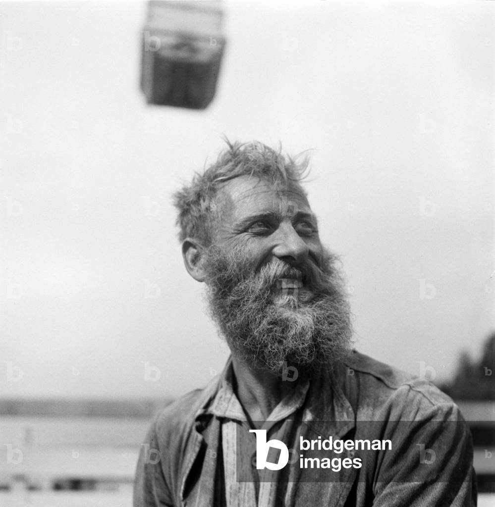 Image of A construction worker with a beard on the construction site
