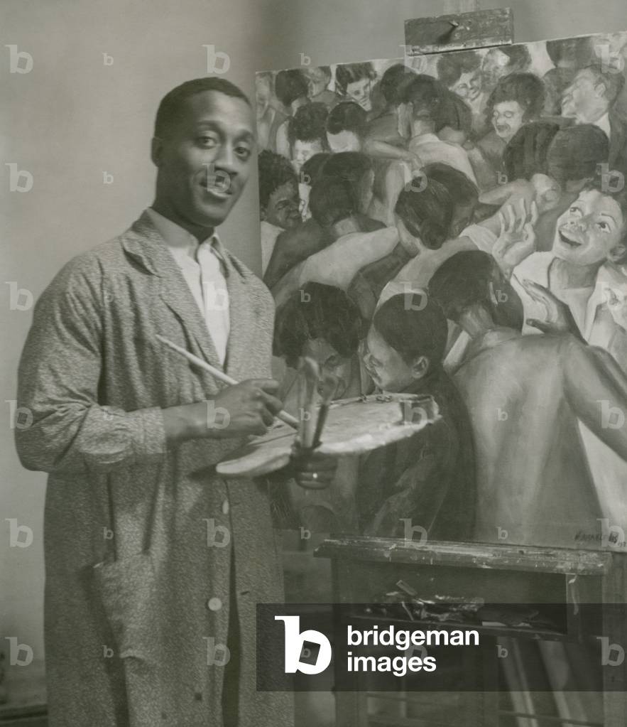 Image of Norman Lewis African-American painter in 1935 with one of his