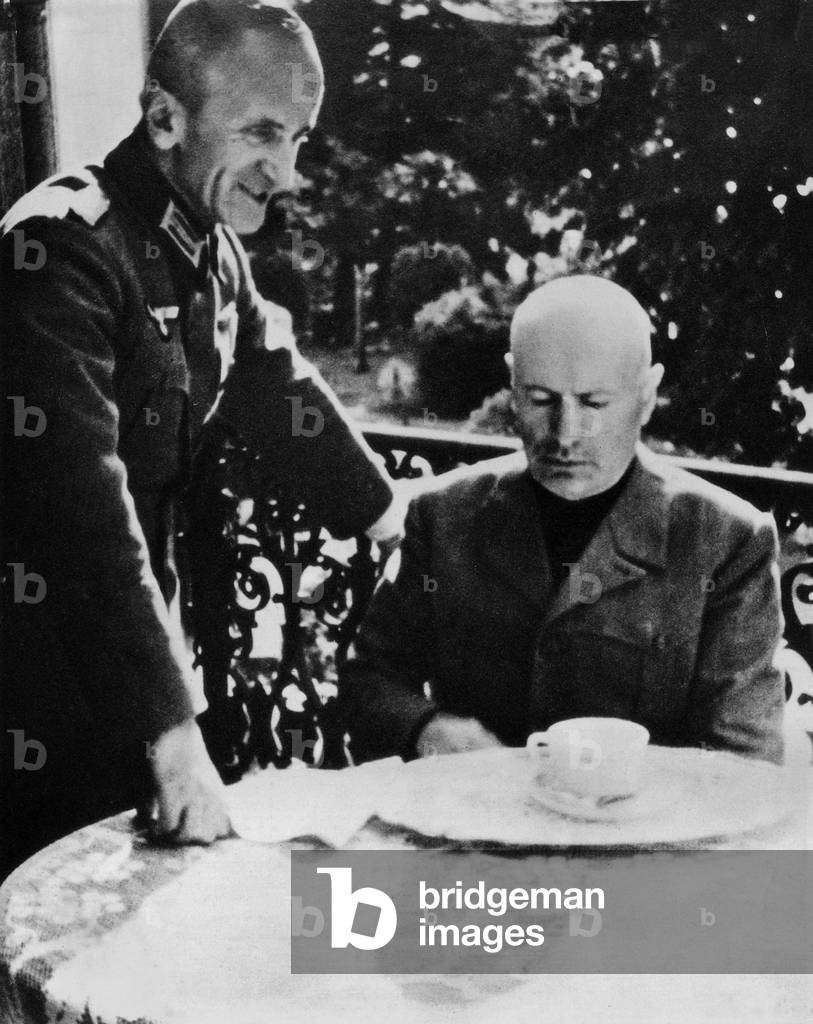 Image of Mussolini in the company of his doctor, March 1944 (b/w