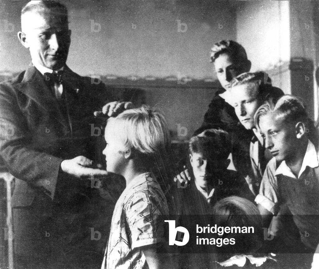 Image of Racial teaching in an elementary school: teacher demonstrates ...