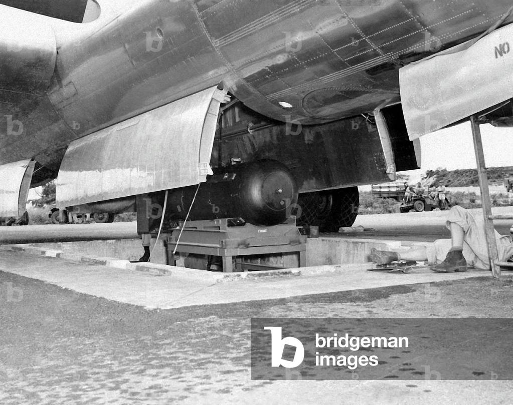 Image of Loading 'Little Boy' bomb into B-29 bomber 'Enola Gay', Tinian,