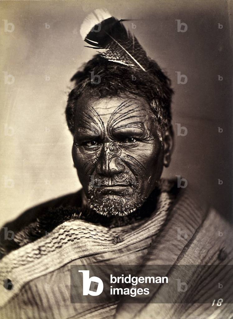 Portrait of a Maori with a tattooed face, c.1886-88 (b/w photo)
