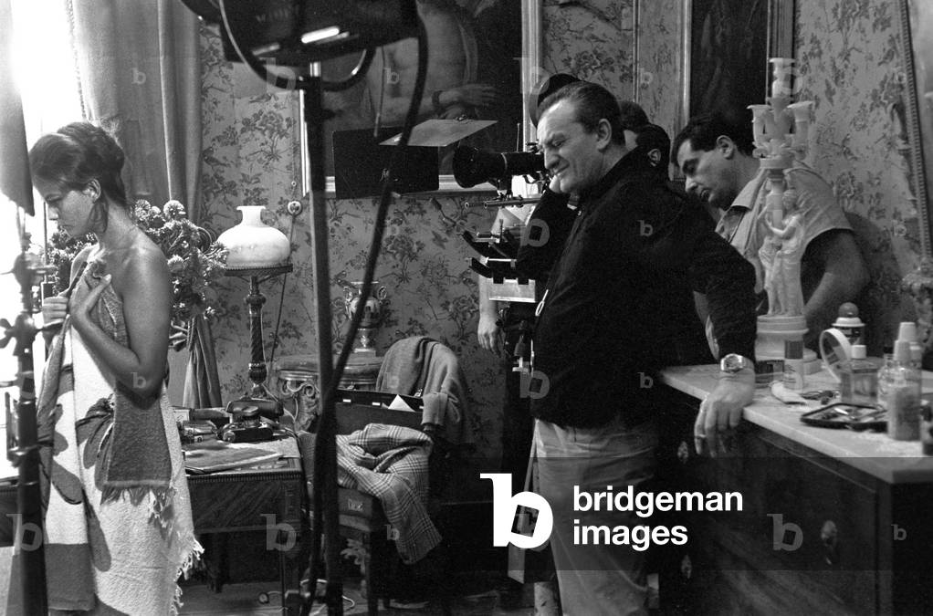 Image of Claudia Cardinale and Luchino Visconti in Sandra, Italy, 1965 (b/w