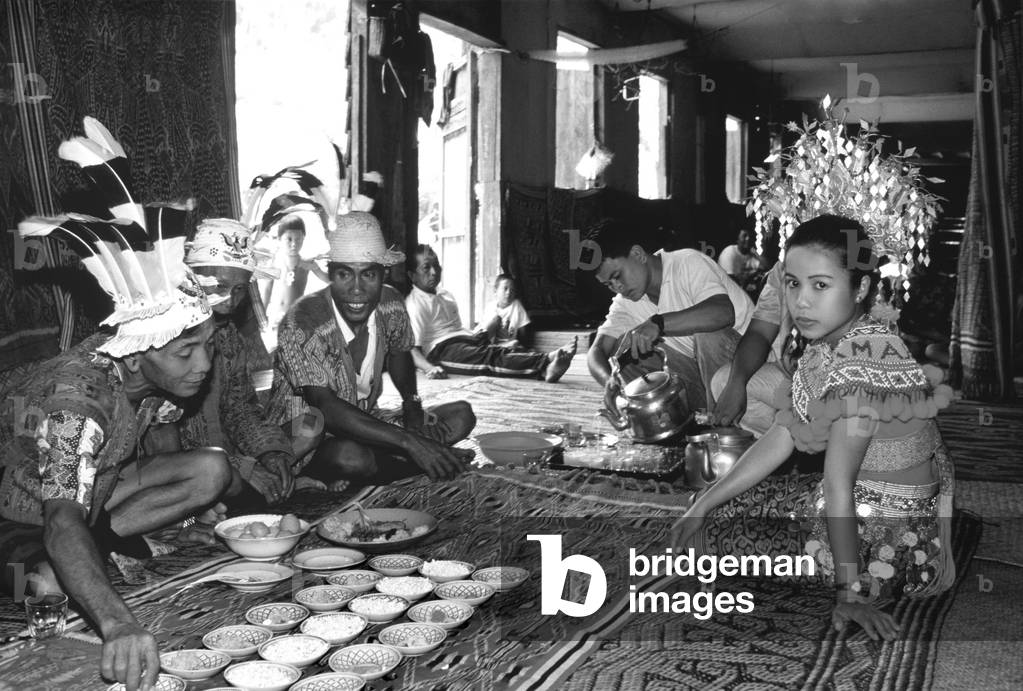 Image of Traditional welcome ceremony in a Dayak Iban Longhouse, Rejang ...