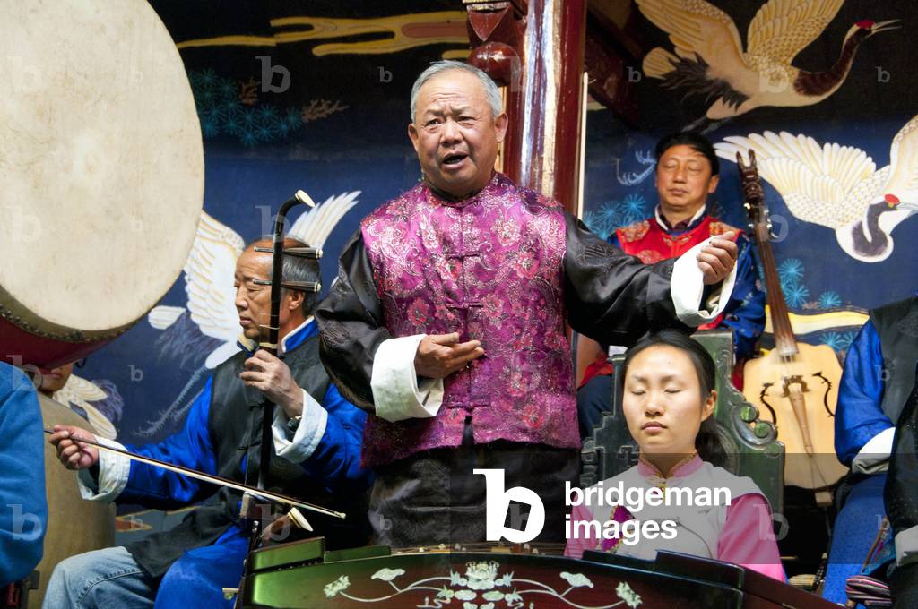 Image of China: Reciting an old poem, the Naxi Folk (Nakhi) Orchestra,