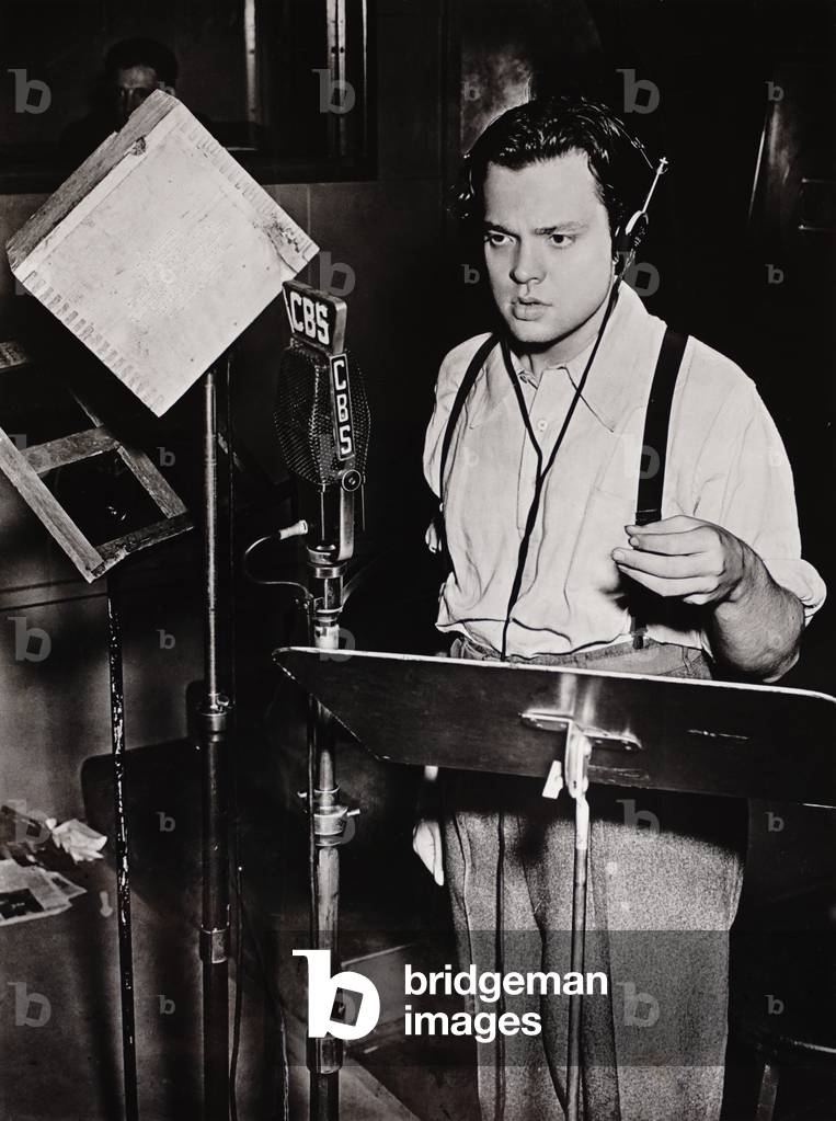 Image of Orson Welles performs on the CBS Radio in 1938. FIRST