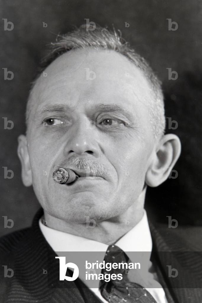 Image of A man smoking a cigar for an advertising campaign, Germany