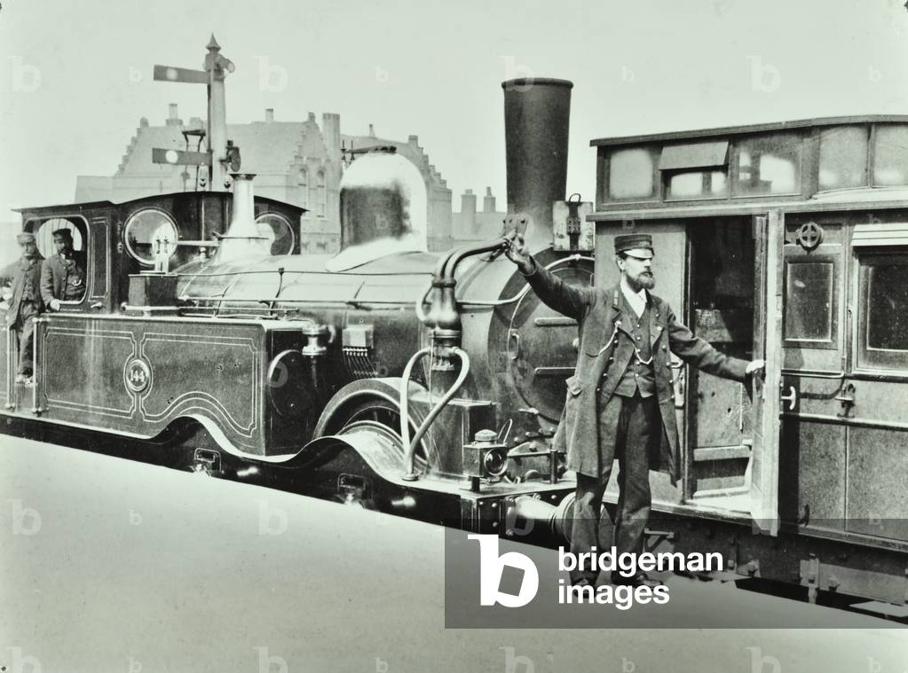 Image of Platform Porter at a railway station, 1885 (b/w photo) by ...