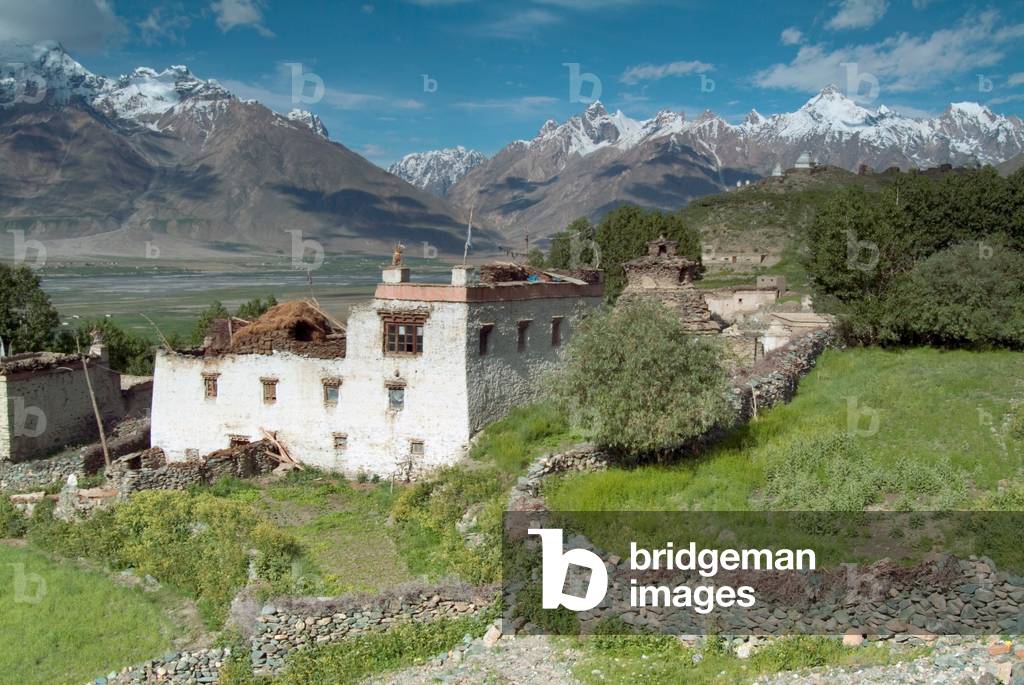 Image of Traditional Himalayan village house in front of Zanskar River ...