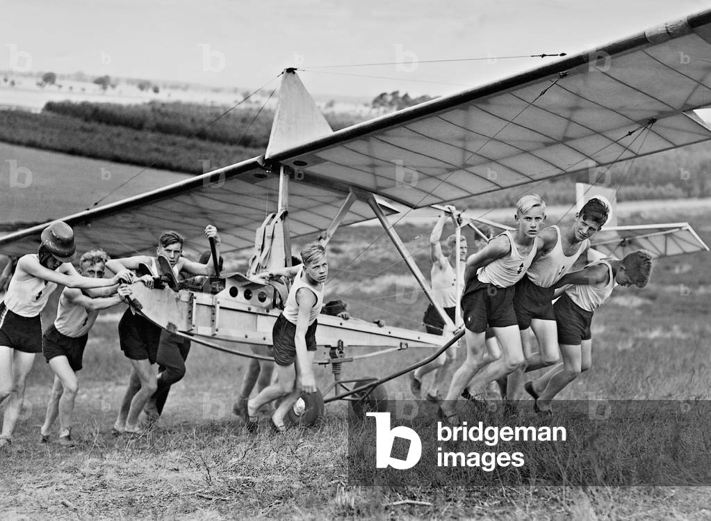 Image of Hitler boys pull a glider, 1939 (b/w photo)