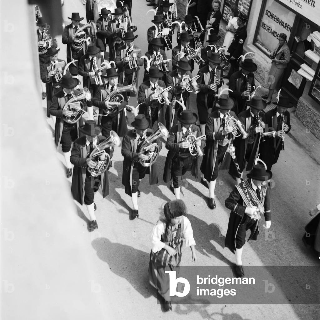 Image of A marching band on its way through Innsbruck in Austria,