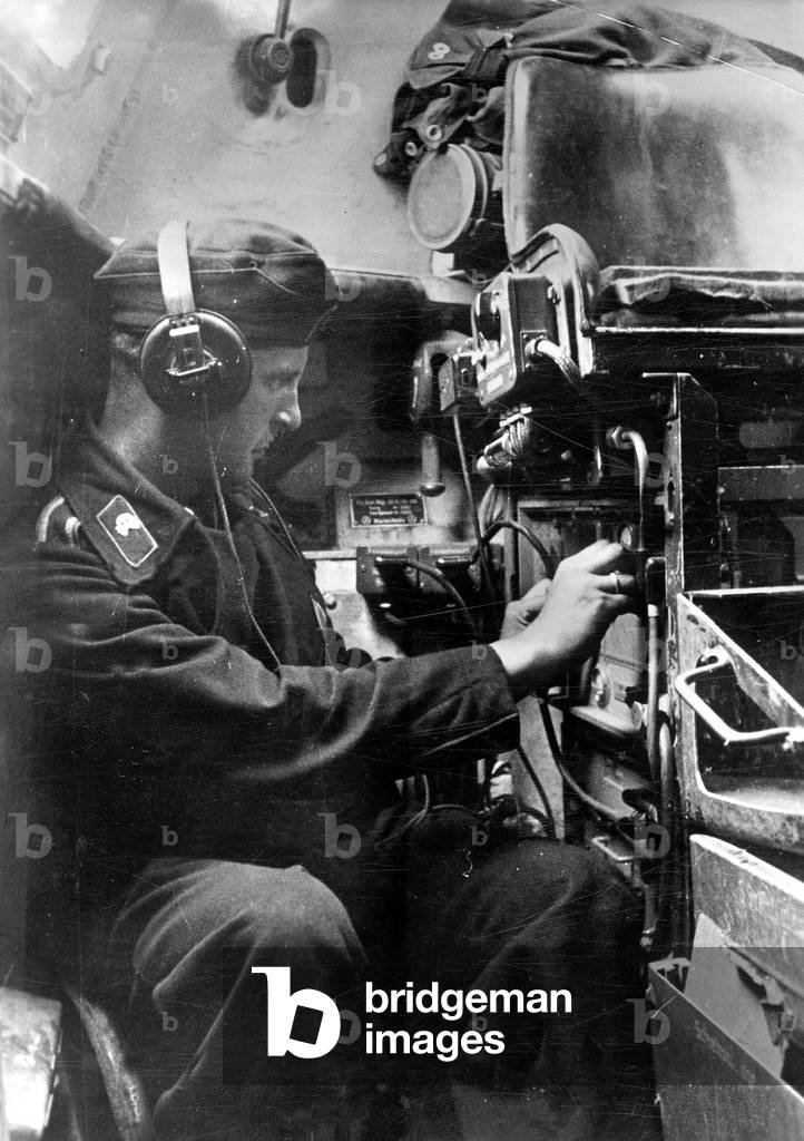 Image of Radio operator in a tank (b/w photo)