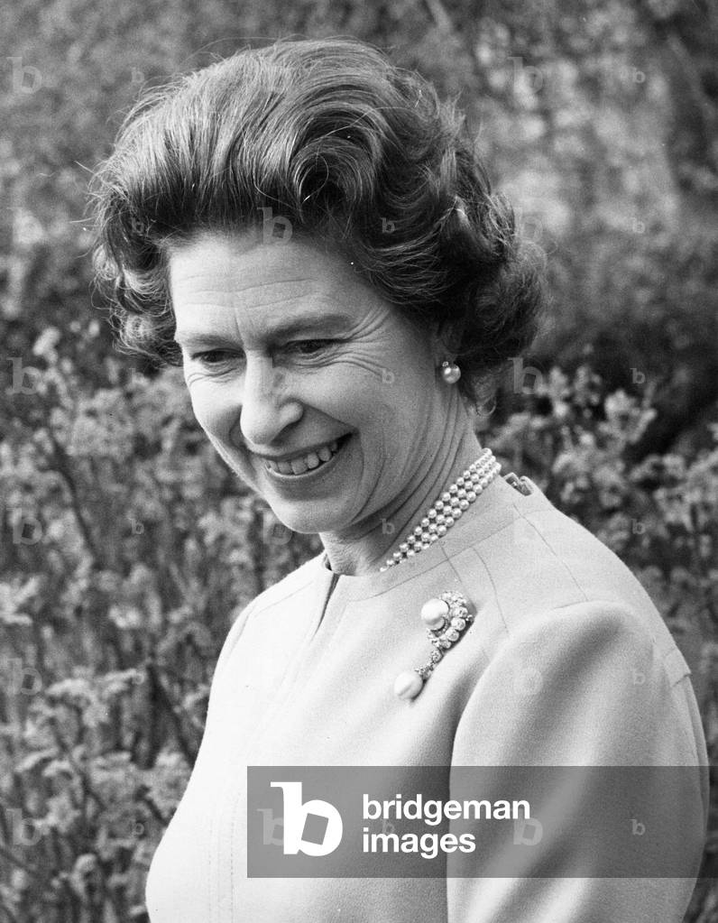 Image of Queen Elizabeth II smiles in the grounds of Windsor Castle,