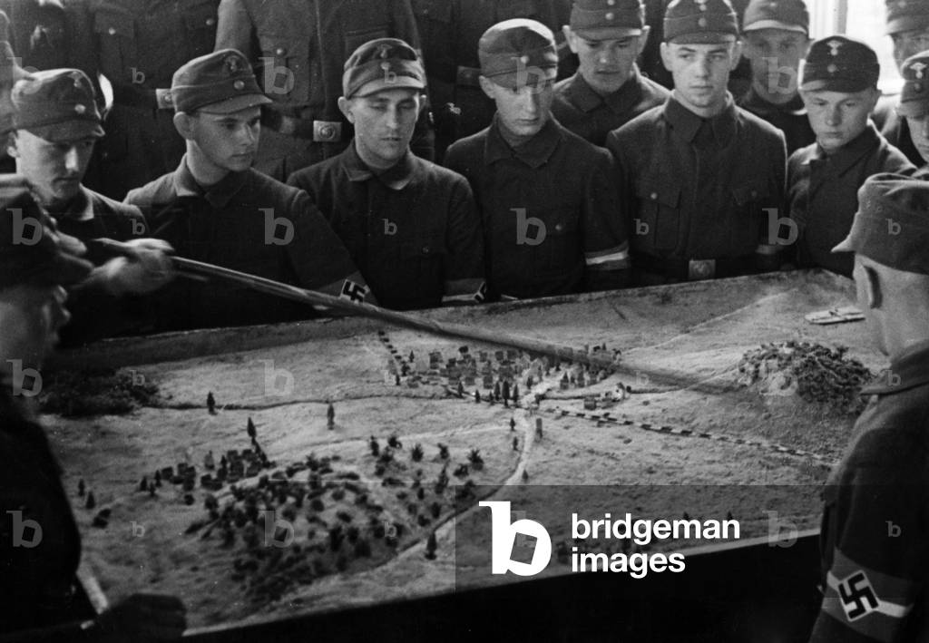 Image of Hitler Youth training at "sand table", 1940 (b/w photo)