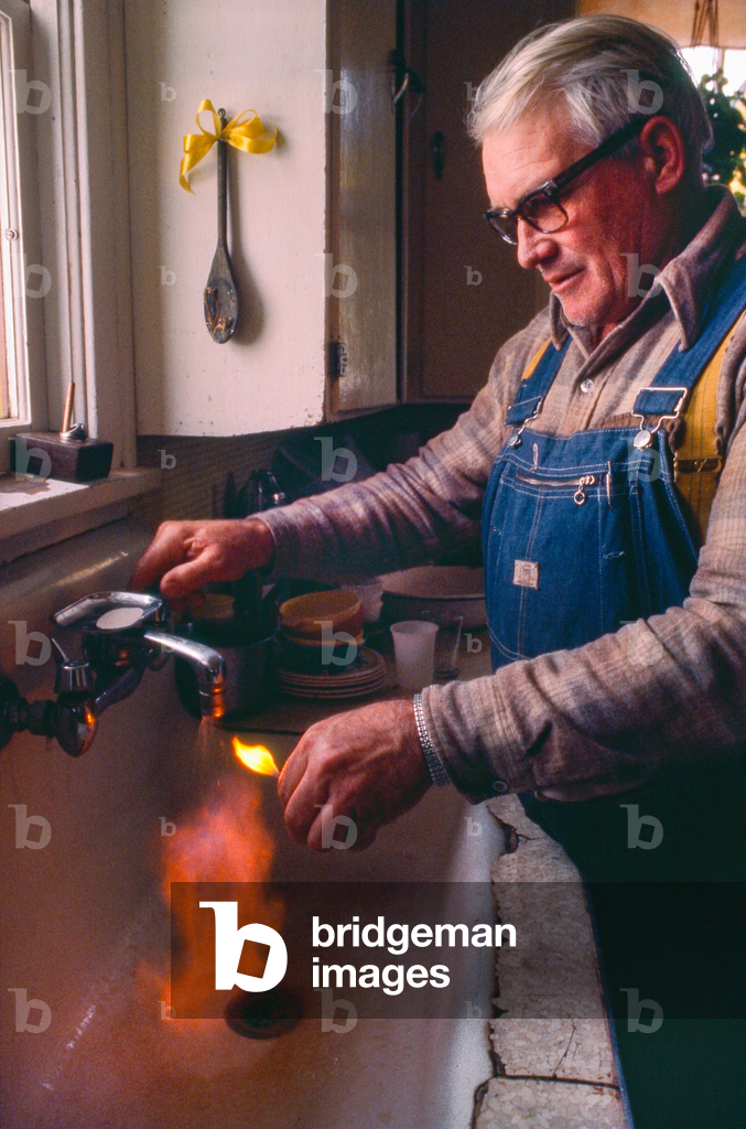 Image of Natural gas come out of water tap in a kitchen by Spiegel, Ted