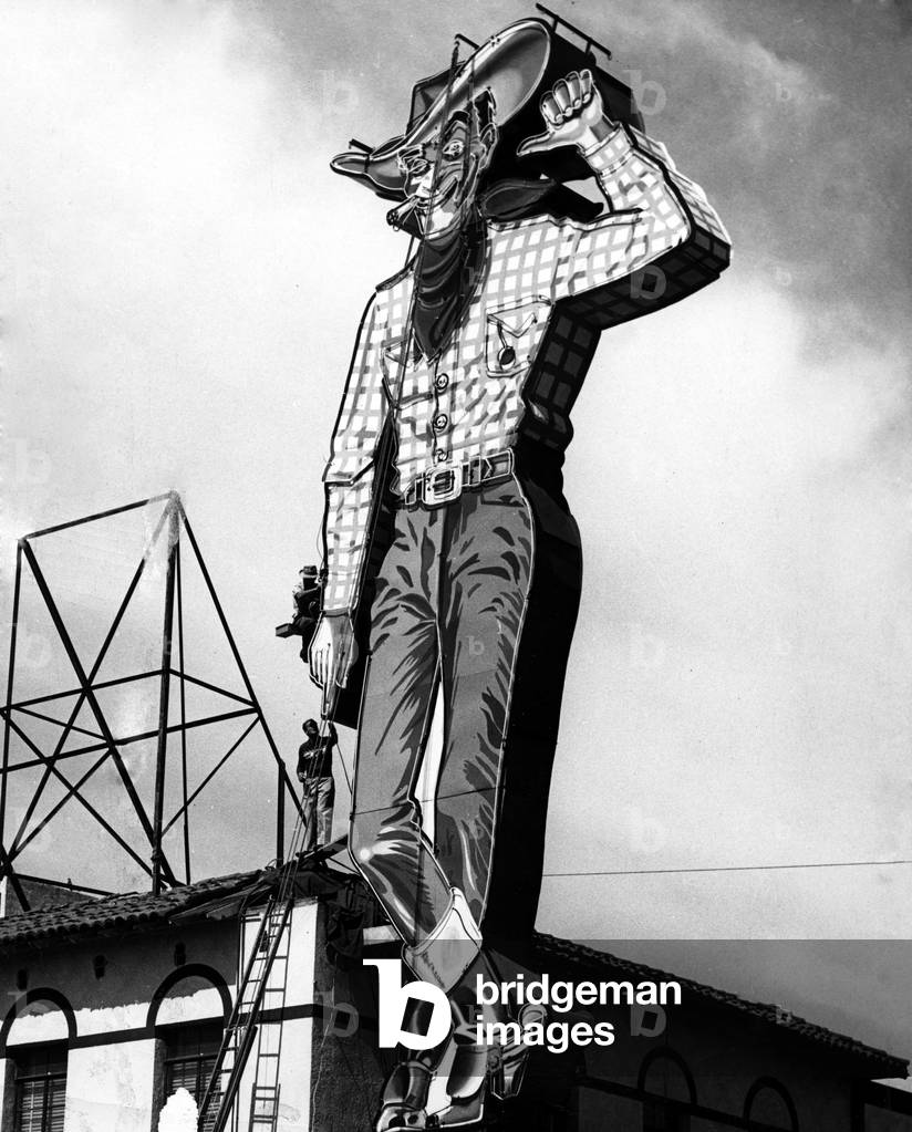 Las Vegas, completing work on 'Vegas Vic' the famous cowboy sign of the ...