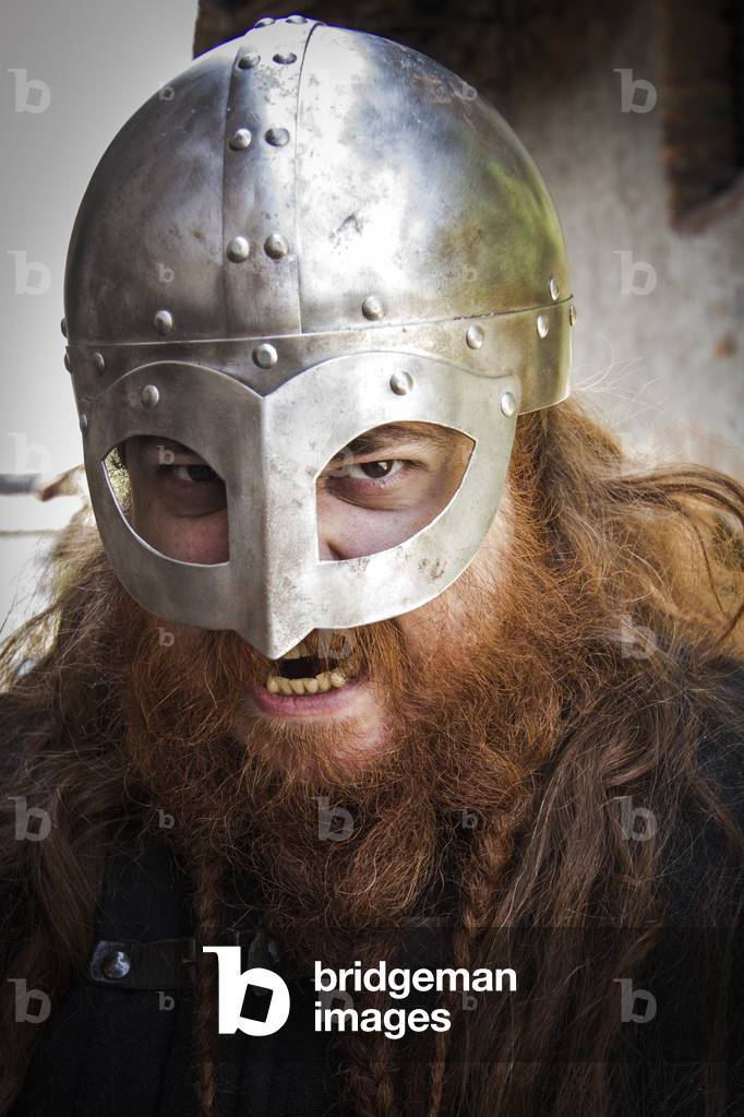 Image of Historical reenactment: Viking Warrior with helmet, 10th century