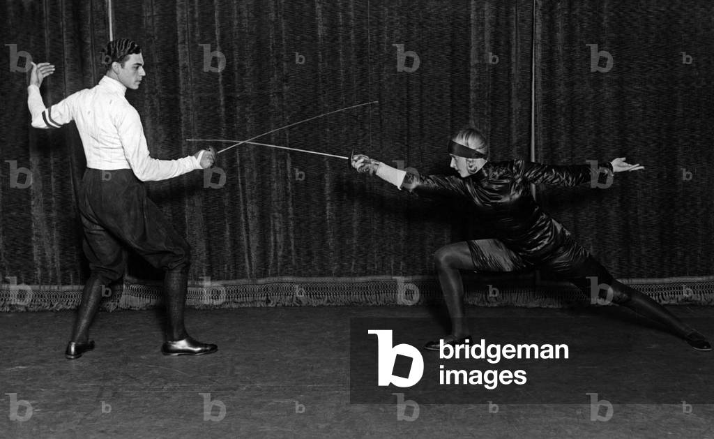 Image of Helene Mayer and Emilio Salafia foil fencing, 1920s (b/w photo)