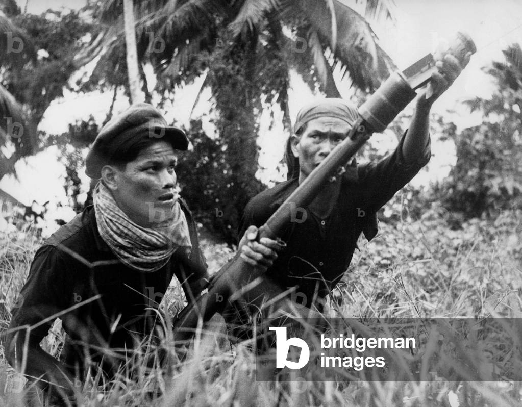 Image of Members of Pathet Lao using a grenade launcher during by ...