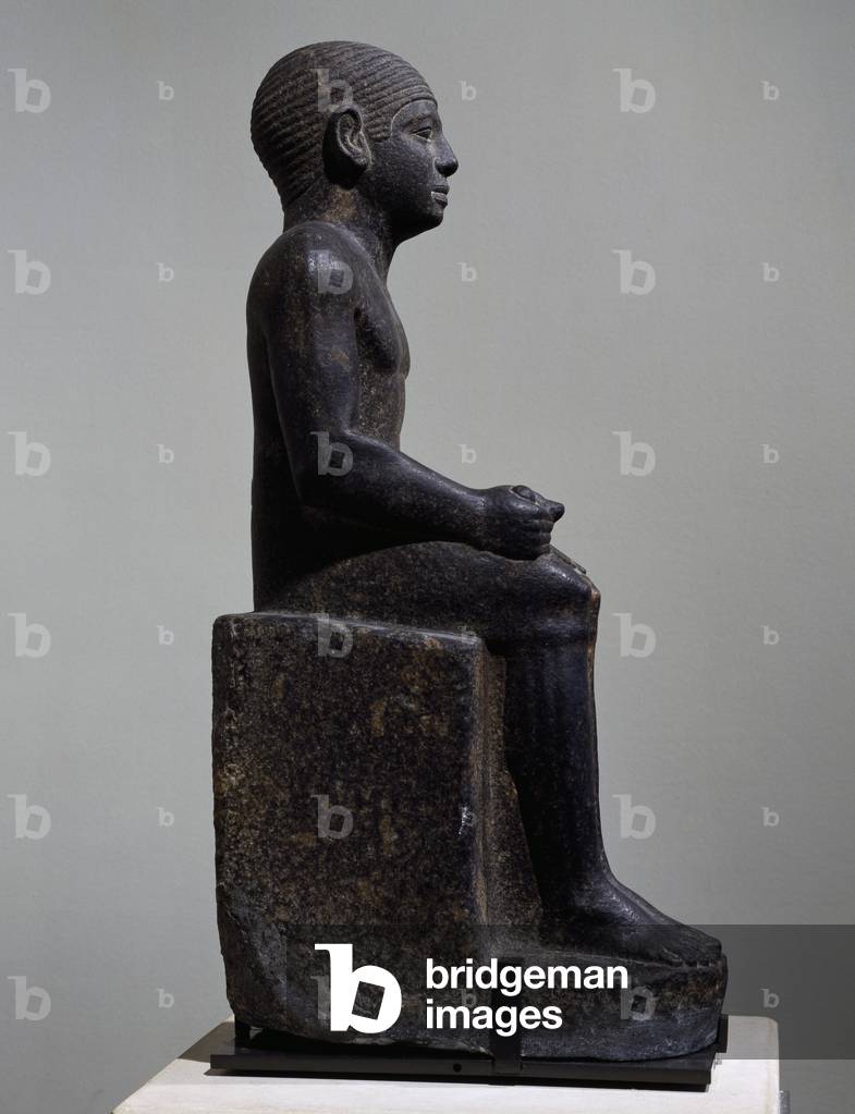 Image of Man seated, side view, diorite statue, Egyptian civilization ...
