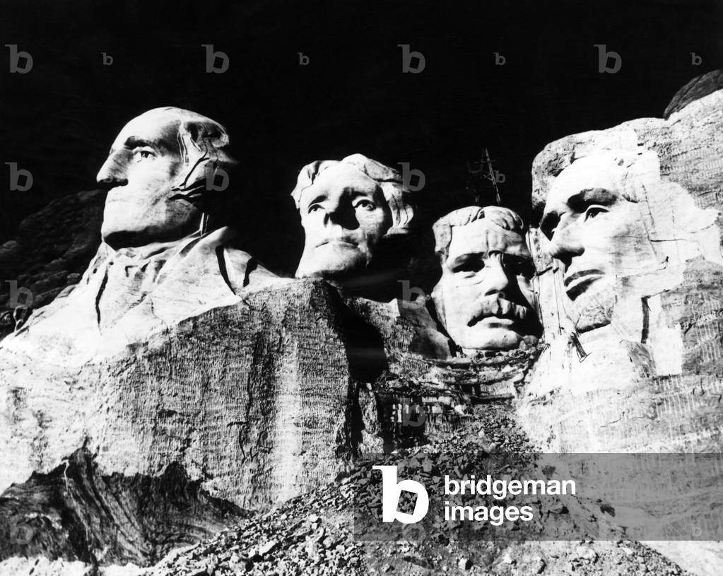 Image of A nearly completed Mount Rushmore, with the faces of U.S.
