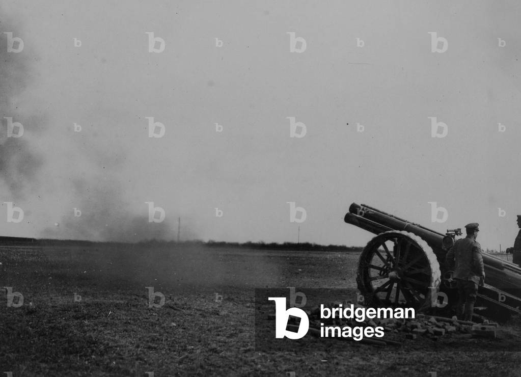 Image of A Gun Crew Firing Their Artillery Piece, 1916 (b/w photo)