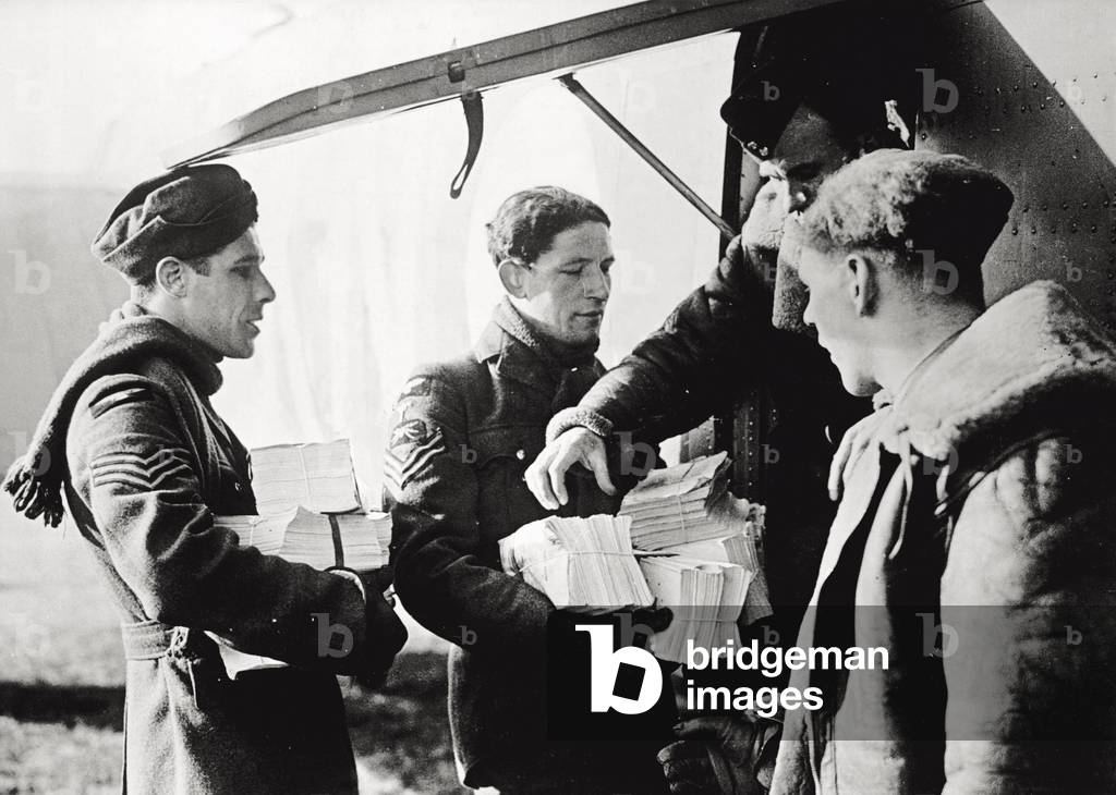 Image of Propaganda leaflets loaded on a British airplane