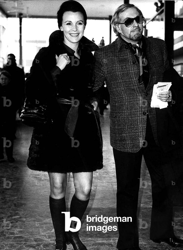 Image of Hilliard Elwim with wife Claire Bloom actress at Heathrow Airport,