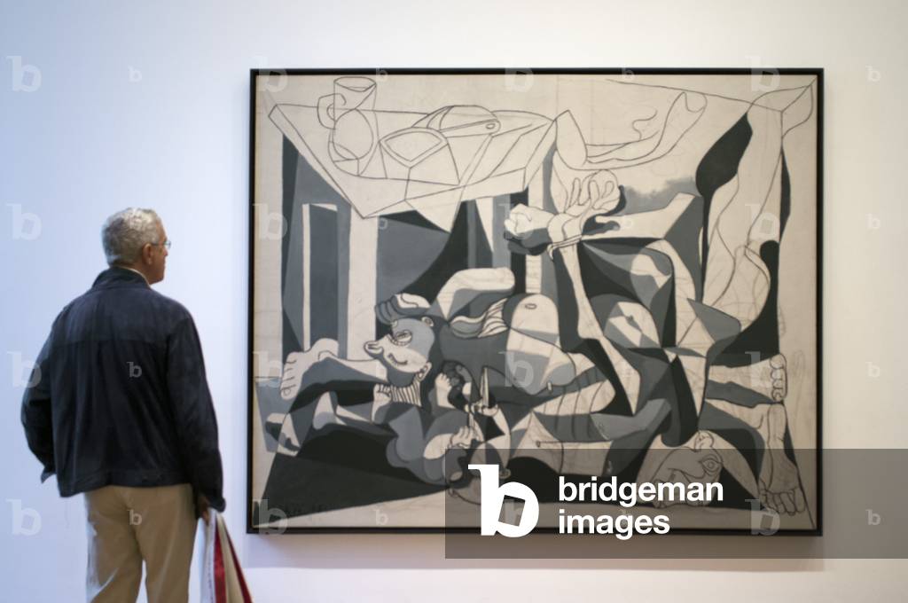 Image of Man standing in front of 'The Charnel House' by Pablo by ...