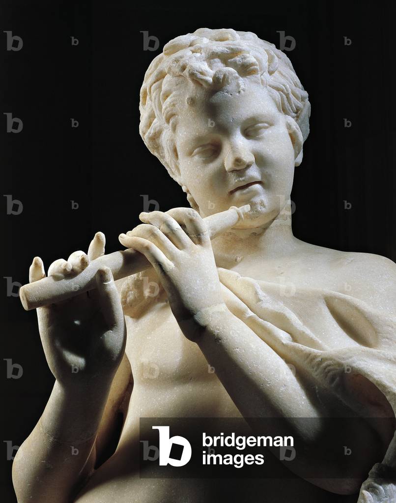 Image of Parian marble statue of young satyr playing flute, detail