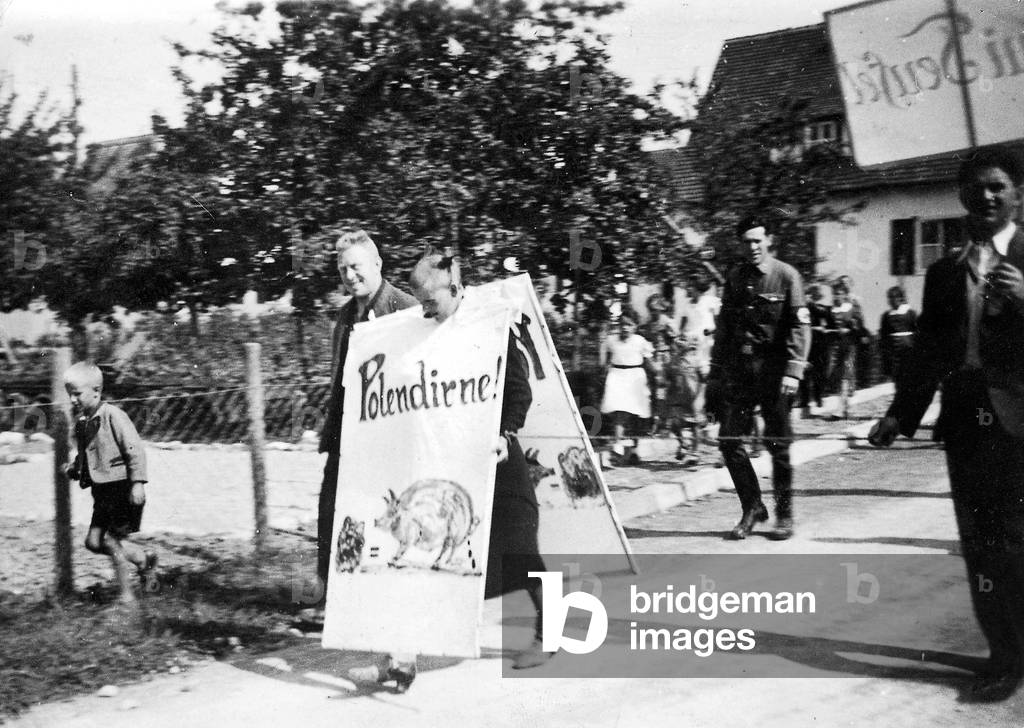 Image of Girl with shame poster "Pole's prostitute" (b/w photo)