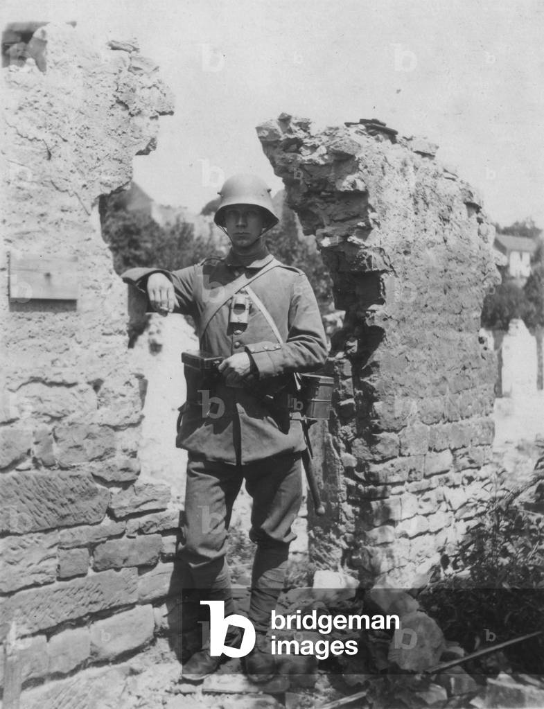 Image of 1917-German telephonist soldier, wearing his helmet, in the ...