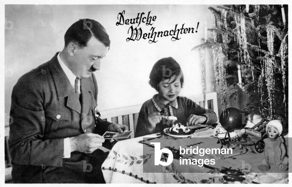 Image of Adolf Hitler with a child, (christmas card)