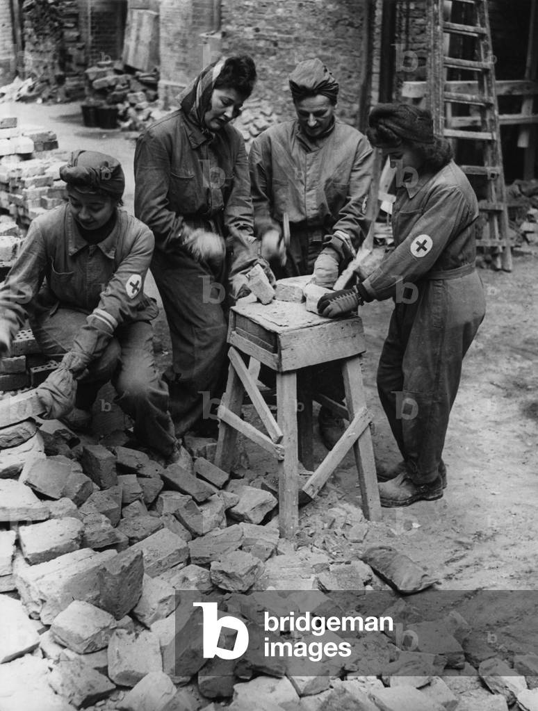 Image of Cleaning up after an air raid, 1944 (b/w photo)