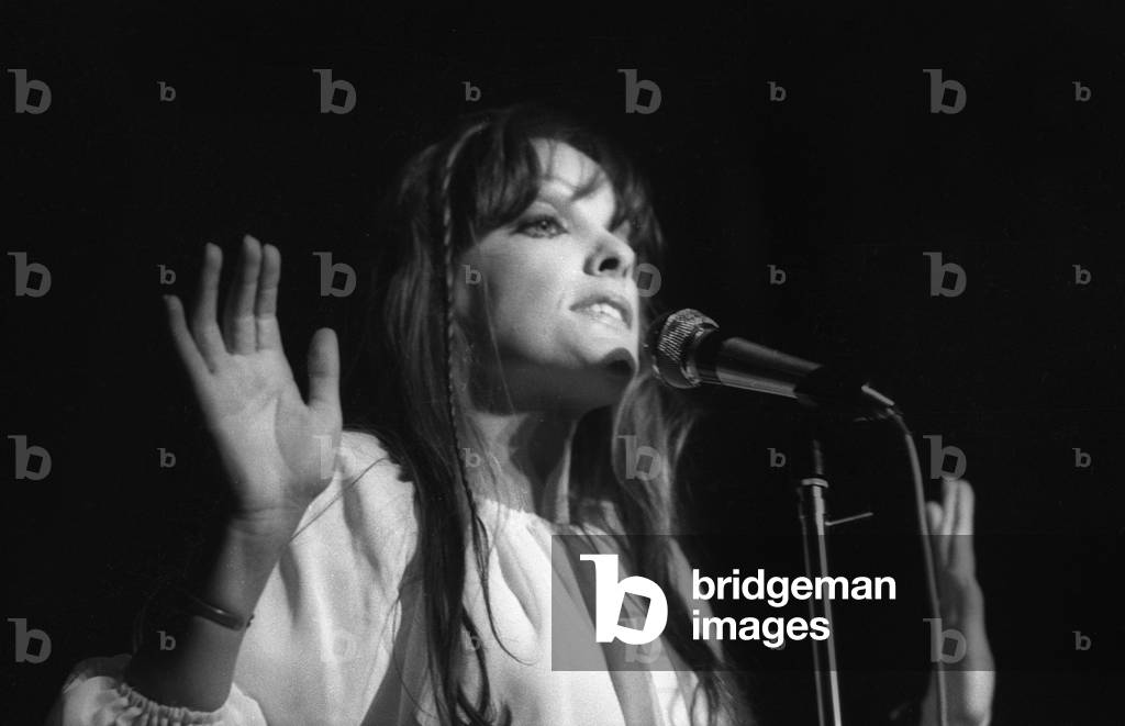 Image of French singer and actress Marie Laforet singing at Bobino in