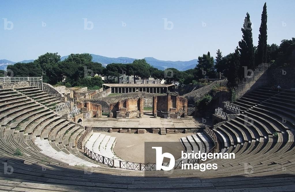 Image of Cavea (auditorium) of theatre with ruins and great portico of