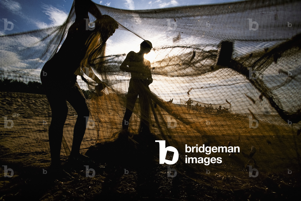 Image of Last stages of net-cleaning. Nothing is wasted. Kerala, India ...