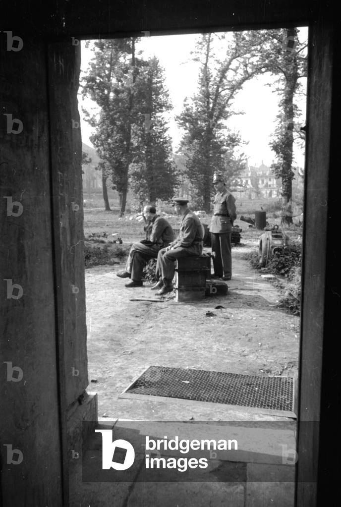 Image of Berlin - View of three men in front of Hitler's