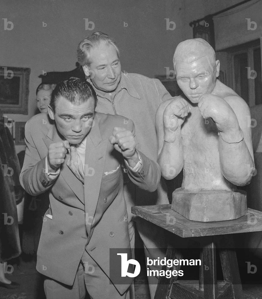 French boxer Robert Villemain with his bust by sculptor Laurent Delhief ...