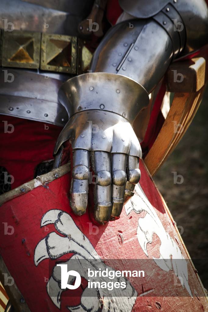 Image of Historical reenactment: Gauntlet and forearm armor of medieval ...