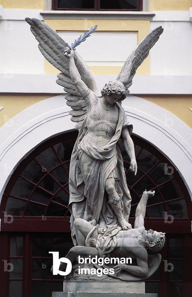 Image of Archangel Michael subduing Satan, statue in Archbishop's ...
