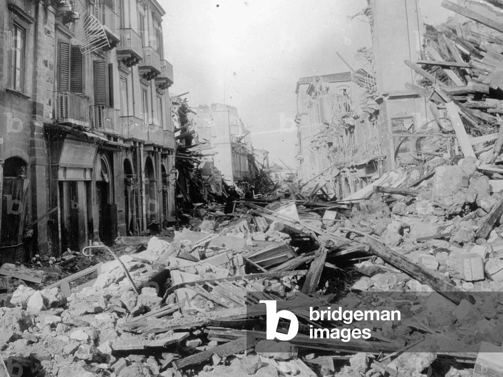 Image of A view of demolished buildings after an earthquake in Messina ...